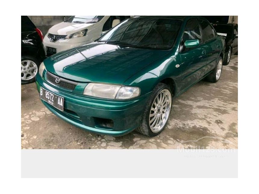 Jual Mobil Mazda 323 1999 BJ 1.8 di DKI Jakarta Manual Sedan Hijau Rp ...